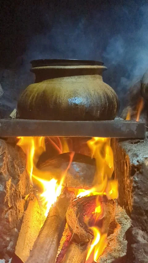 traditional cooking pot under heat in a ... | Stock Video | Pond5