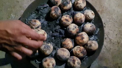 traditional food dish litti making on co... | Stock Video | Pond5