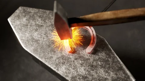 Traditional forge with an old anvil. Ham... | Stock Video | Pond5