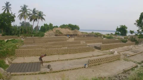 Traditional man made brick industry work... | Stock Video | Pond5