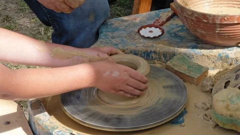 Traditional potter and boy on a potter's... | Stock Video | Pond5