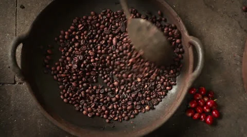 Traditional process of fry coffee beans. | Stock Video | Pond5