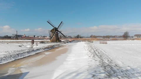 Traditional winter Dutch windmill scene ... | Stock Video | Pond5
