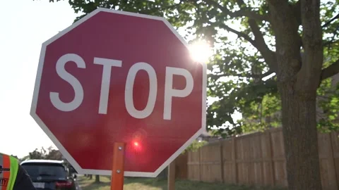 Traffic control with stop slow sign acco... | Stock Video | Pond5