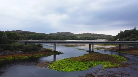 Traffic driving over Morar River Bridge ... | Stock Video | Pond5