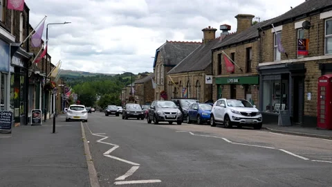 Traffic driving past Lloyds bank in New ... | Stock Video | Pond5