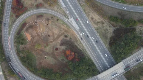 Traffic intersection in form of loop and... | Stock Video | Pond5