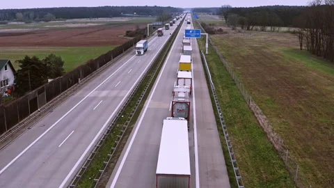 A traffic jam with a long queue of truck... | Stock Video | Pond5