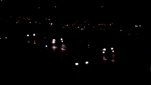 Traffic jams on an unlit night road | Stock Video | Pond5