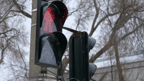 Traffic light changes color on big city ... | Stock Video | Pond5