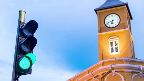 Traffic light with clock tower in color ... | Stock Video | Pond5