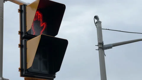 Traffic light displaying walk signal in ... | Stock Video | Pond5