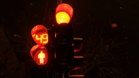 Traffic light switches from red to green... | Stock Video | Pond5
