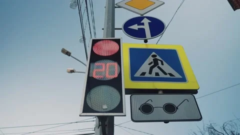 Traffic lights and road signs | Stock Video | Pond5