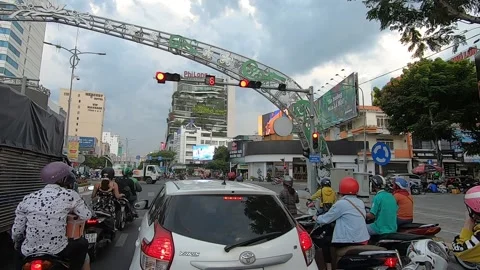 Traffic lights in a big asian city, lots... | Stock Video | Pond5