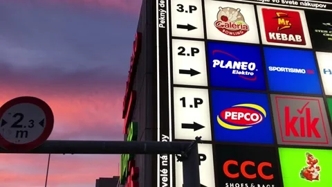 Traffic signs and shopping mall entrace ... | Stock Video | Pond5