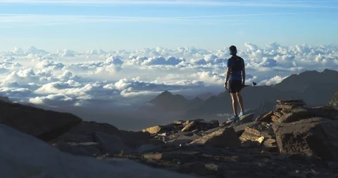 Trail runner man running reaching mounta... | Stock Video | Pond5