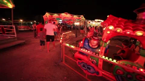 Train and Merry Go Round at Amusement Pa... | Stock Video | Pond5