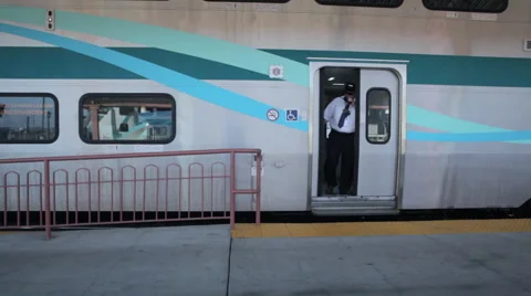 Train conductor on the phone on amtrak m... | Stock Video | Pond5