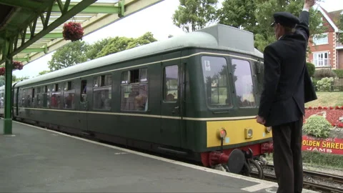 Train Guard Signals to the Driver to Lea... | Stock Video | Pond5