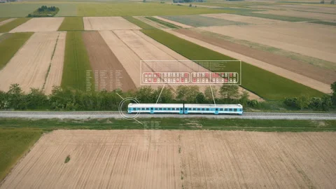 A train running on track amidst fields w... | Stock Video | Pond5