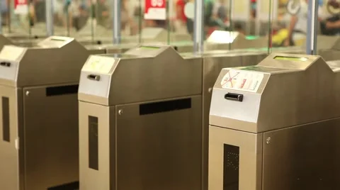 Train ticket gate - people going to work | Stock Video | Pond5