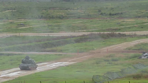 Training shooting from tank guns and a s... | Stock Video | Pond5