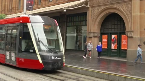 A tram arriving at the Queen Victoria Bu... | Stock Video | Pond5