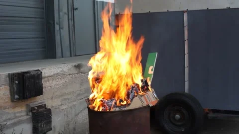Trash Can Fire Rages In Steel Barrel Dum... | Stock Video | Pond5