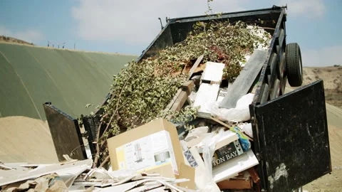 Trash Falling Into Landfill From Dump Tr... | Stock Video | Pond5