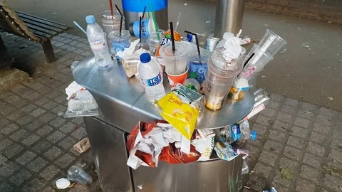 Trash Spilling Out Stock Footage ~ Royalty Free Stock Videos | Pond5