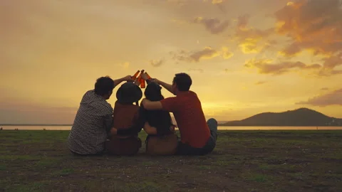 travel-loving friends hold their drinks ... | Stock Video | Pond5