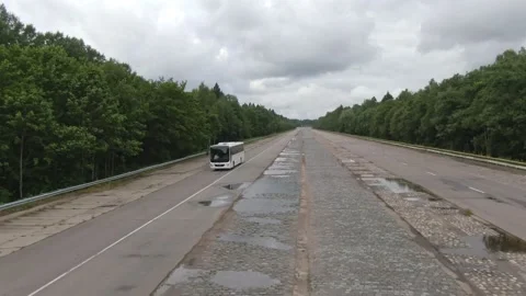 Travel white bus driving on autobahn thr... | Stock Video | Pond5