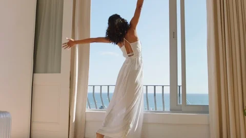 travel woman dancing in hotel room havin... | Stock Video | Pond5