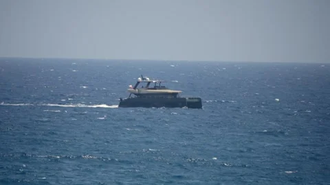 Traversing the deep blue, the catamaran'... | Stock Video | Pond5