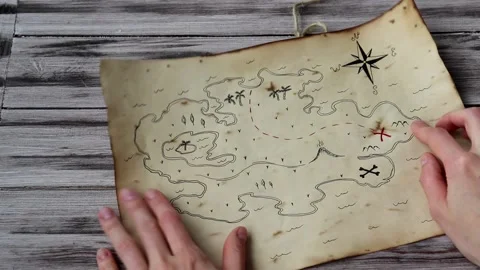 Treasure map on a wooden background. Scr... | Stock Video | Pond5