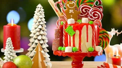 On trend candyland Christmas drip cake | Stock Video | Pond5