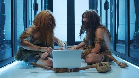 Tribe of prehistoric wild people sitting... | Stock Video | Pond5