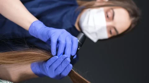 A trichologist examines a person. Doctor... | Stock Video | Pond5