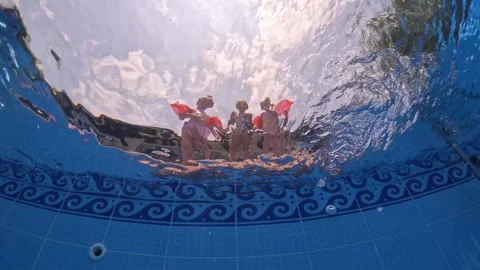 triplet sisters kids jumping in swiming ... | Stock Video | Pond5