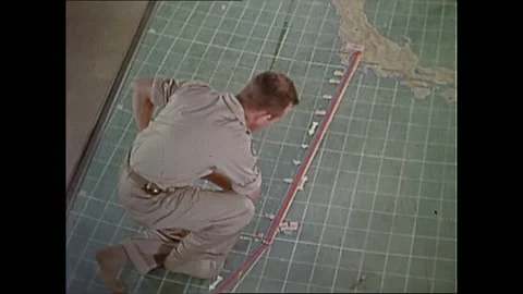 Troop Marks Positions on Chart | Stock Video | Pond5