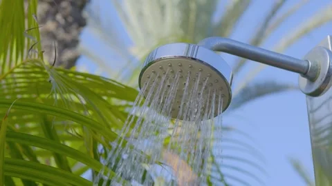 A tropical outdoor shower with water flo... | Stock Video | Pond5