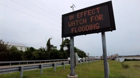 Tropical Storm Warning Sign flashing on ... | Stock Video | Pond5