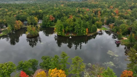 Truck shot features fall foliage on wate... | Stock Video | Pond5