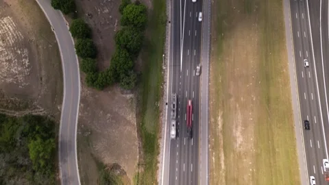trucks and car on the road. interstate h... | Stock Video | Pond5