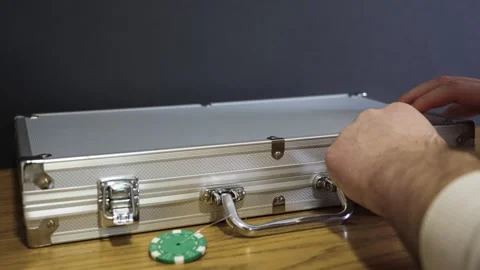 Trying and failing to open a case with a... | Stock Video | Pond5