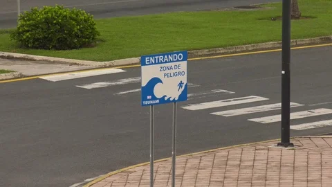 Tsunami Warning sign in Spanish | Stock Video | Pond5