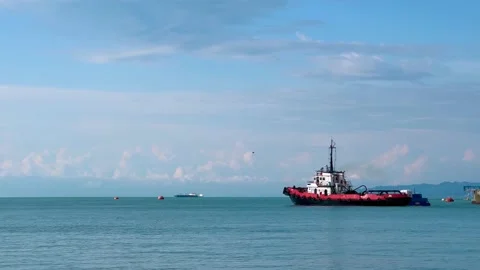 Tug boat is moving forward, sailing on t... | Stock Video | Pond5