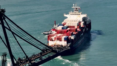 Tug Boat Pulling Container Ship Out to S... | Stock Video | Pond5