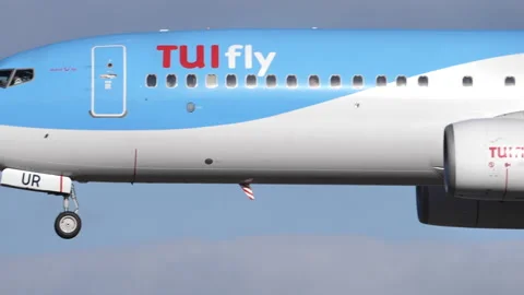 TUIfly logo on the fuselage of the Boein... | Stock Video | Pond5